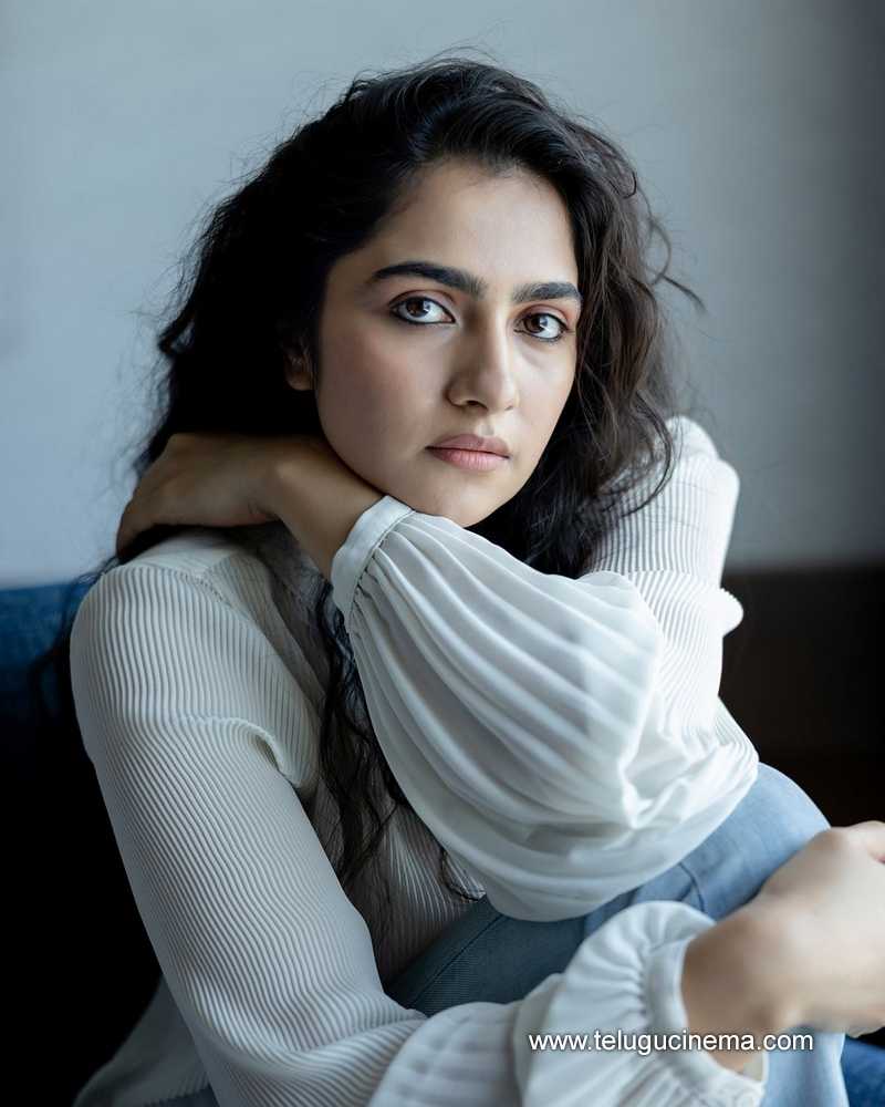 Rukmini Vasanth in a white top