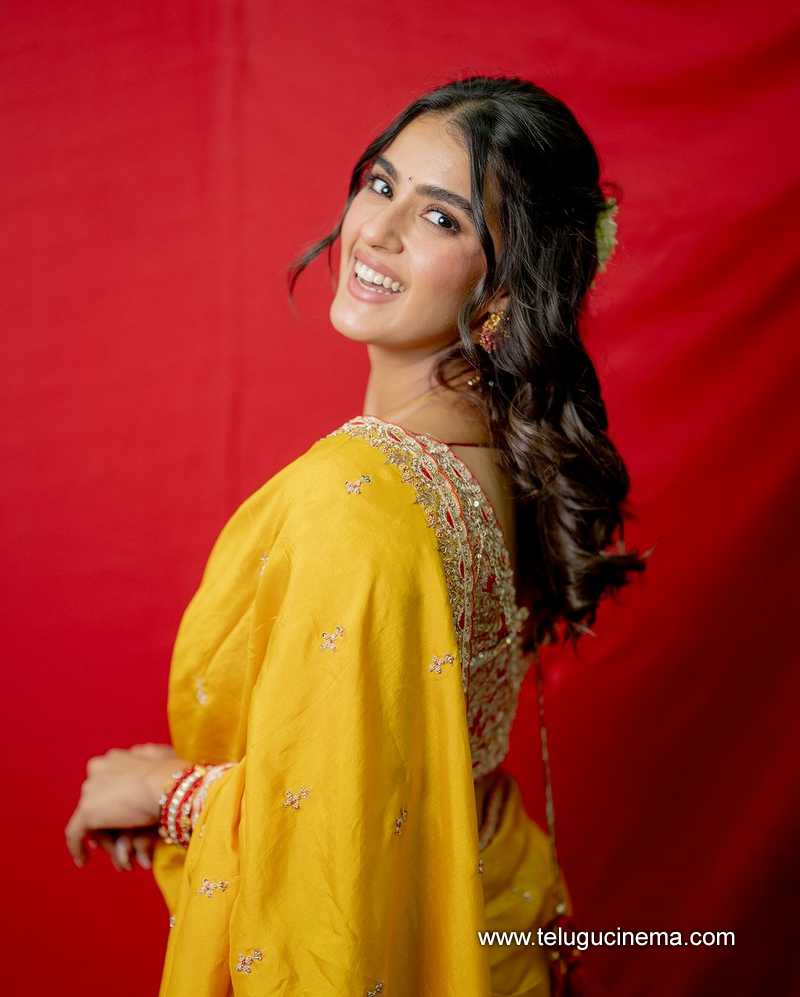 Kavya Thapar in an yellow Saree