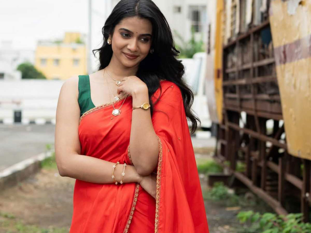 Sri Gouri Priya sizzles in a striking red saree