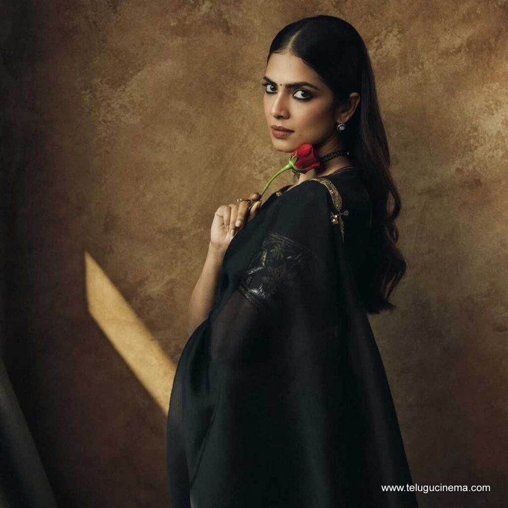Malavika Mohanan with a rose - Telugu Cinema | News, Reviews & Daily Entertainment